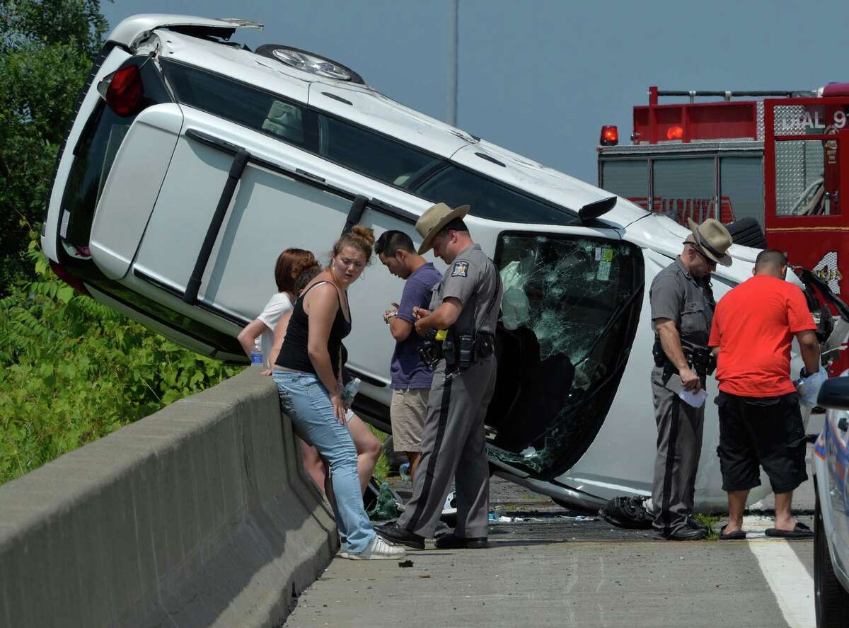 Flipped car ties up Northway traffic