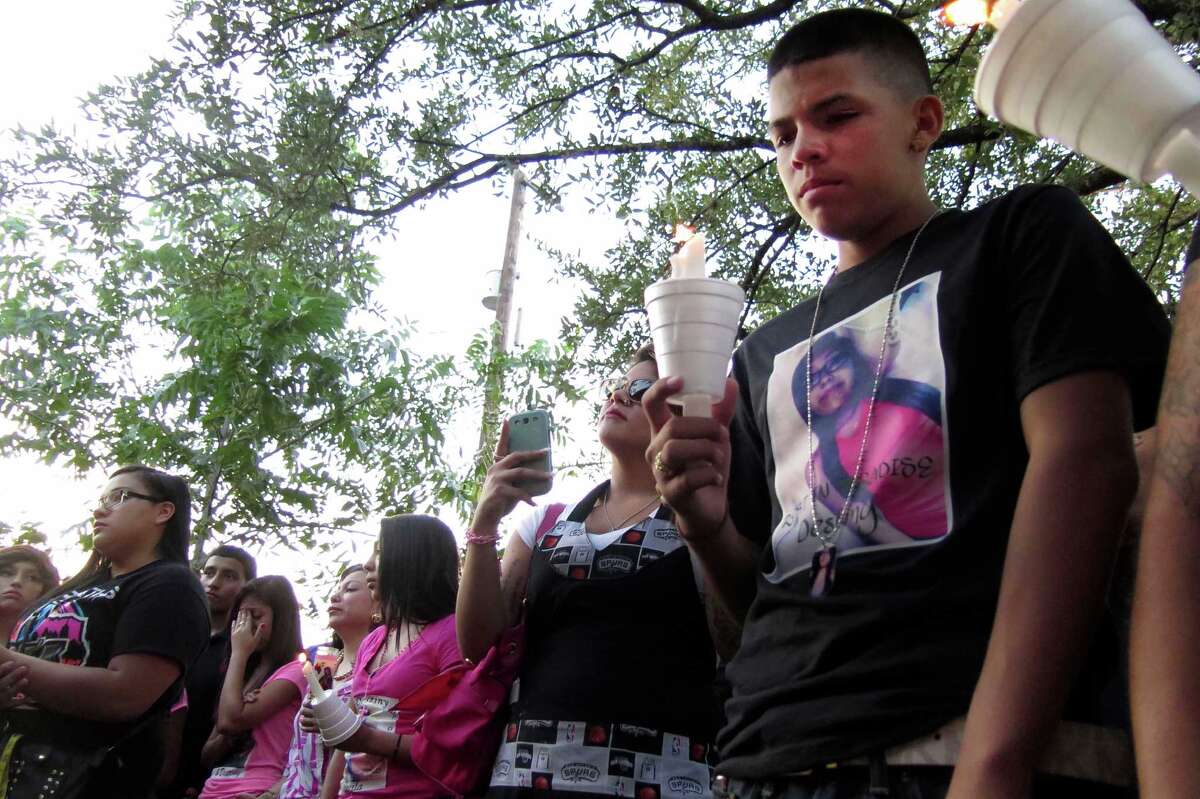 Family killed in double-murder suicide remembered at vigil