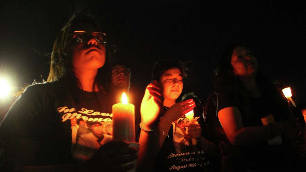 Hundreds hold vigil for young man found dead last week