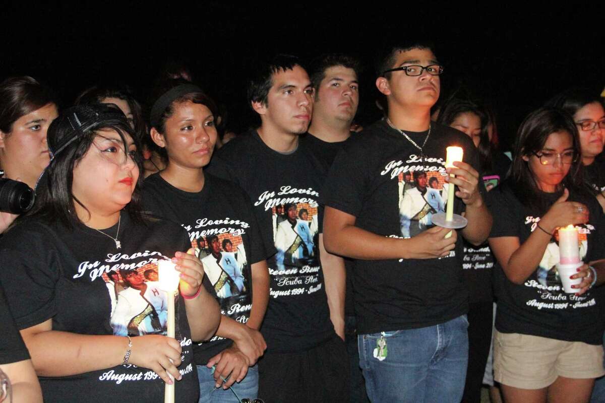 Hundreds hold vigil for young man found dead last week
