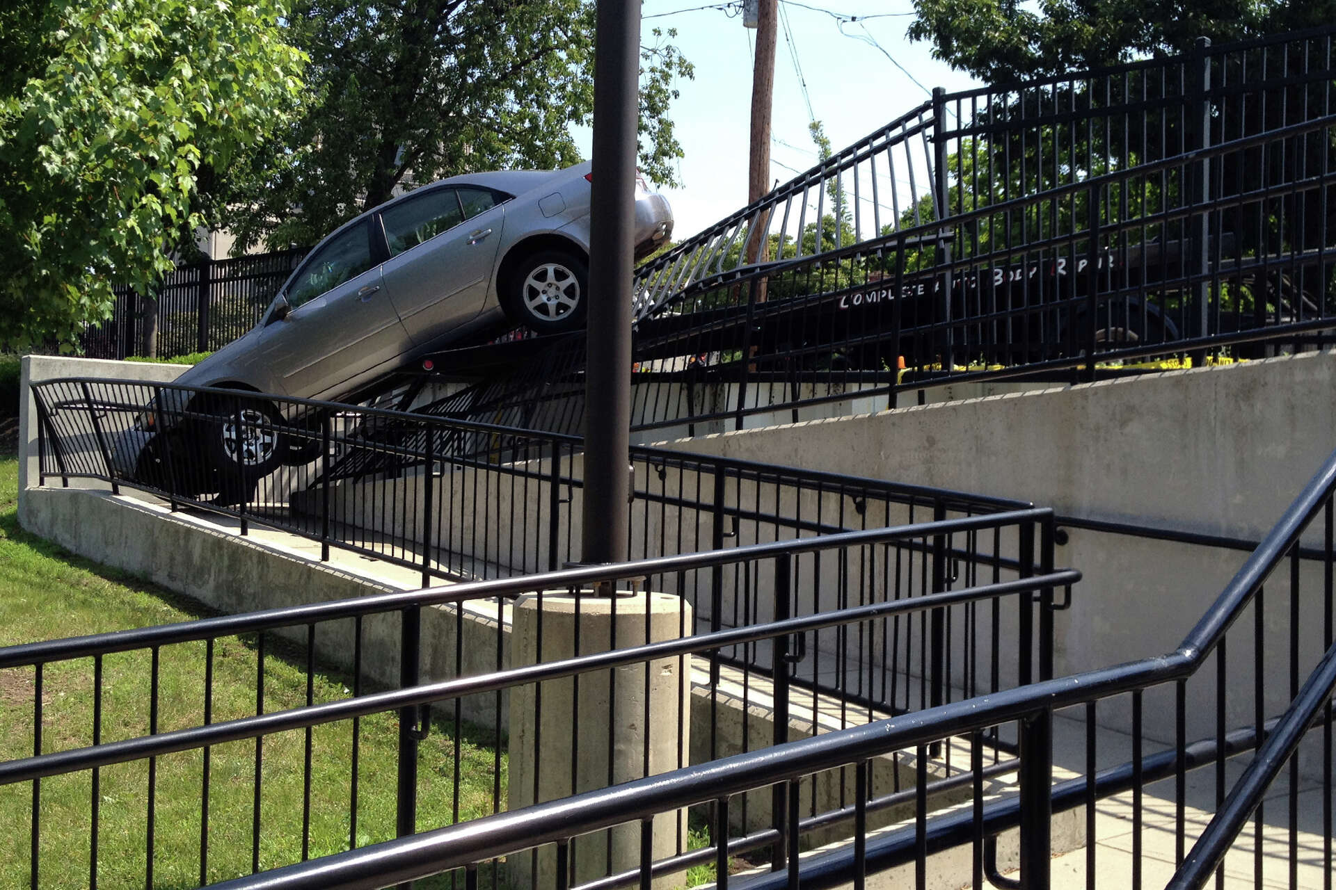Car plows into Bridgeport ER fence