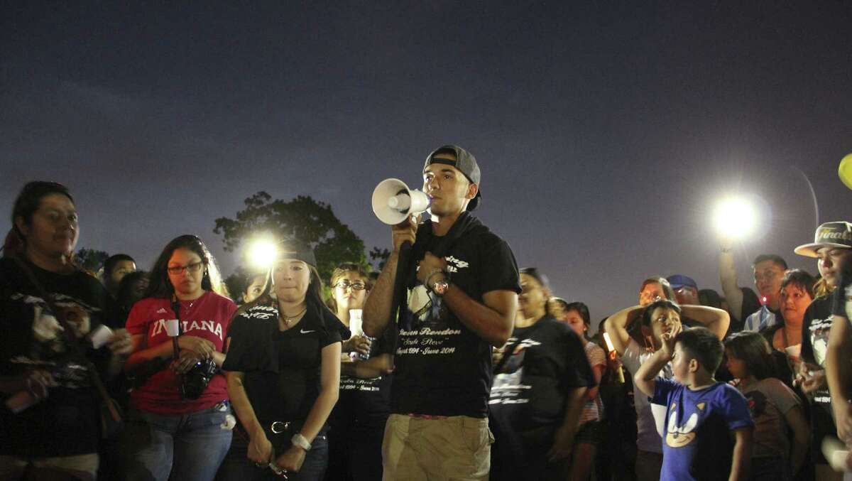 Hundreds hold vigil for young man found dead last week