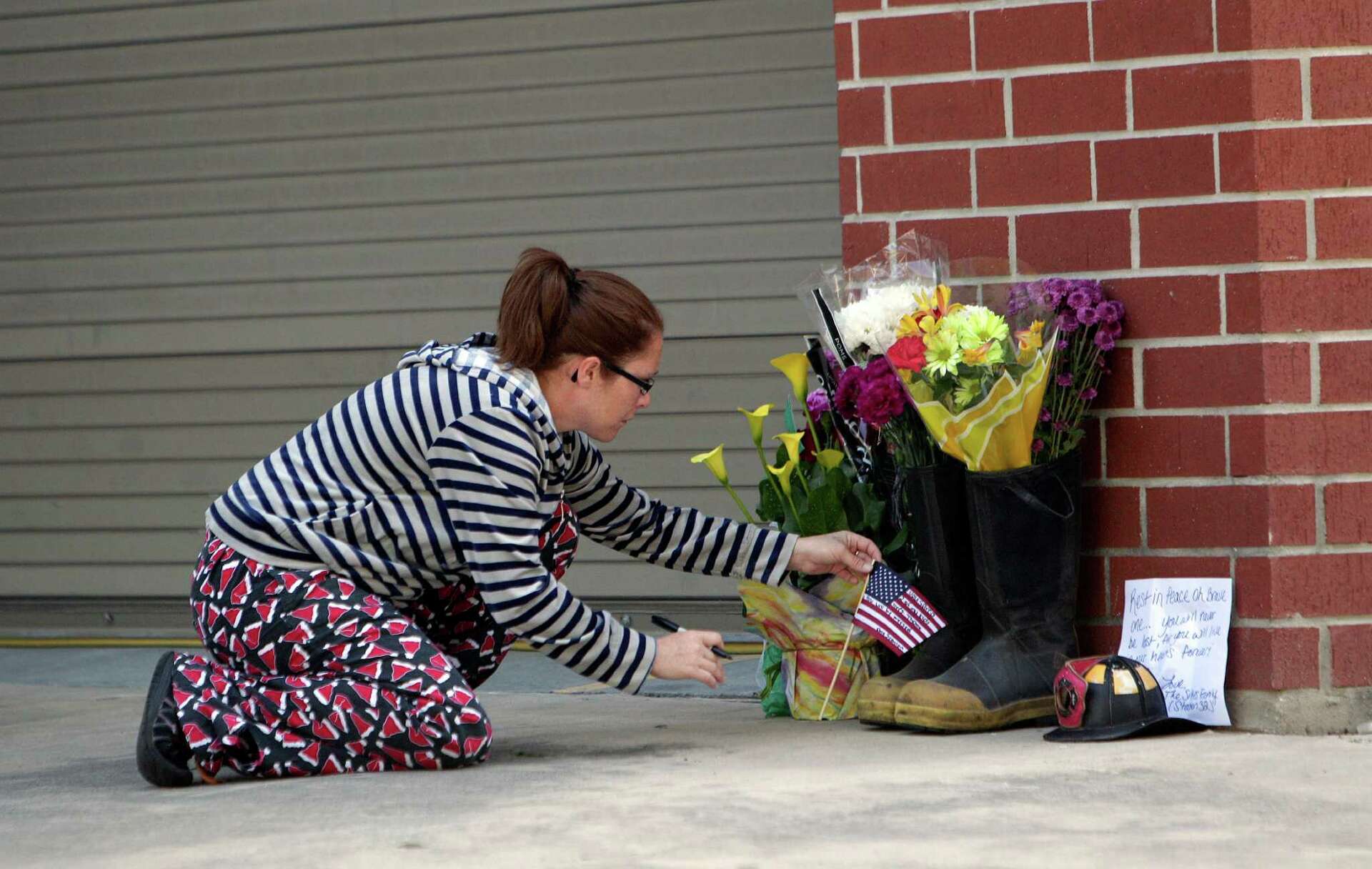 Firefighter dies in house blaze