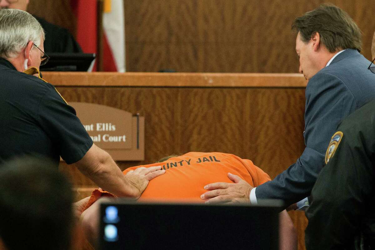 Suspect in Spring killings collapses in court