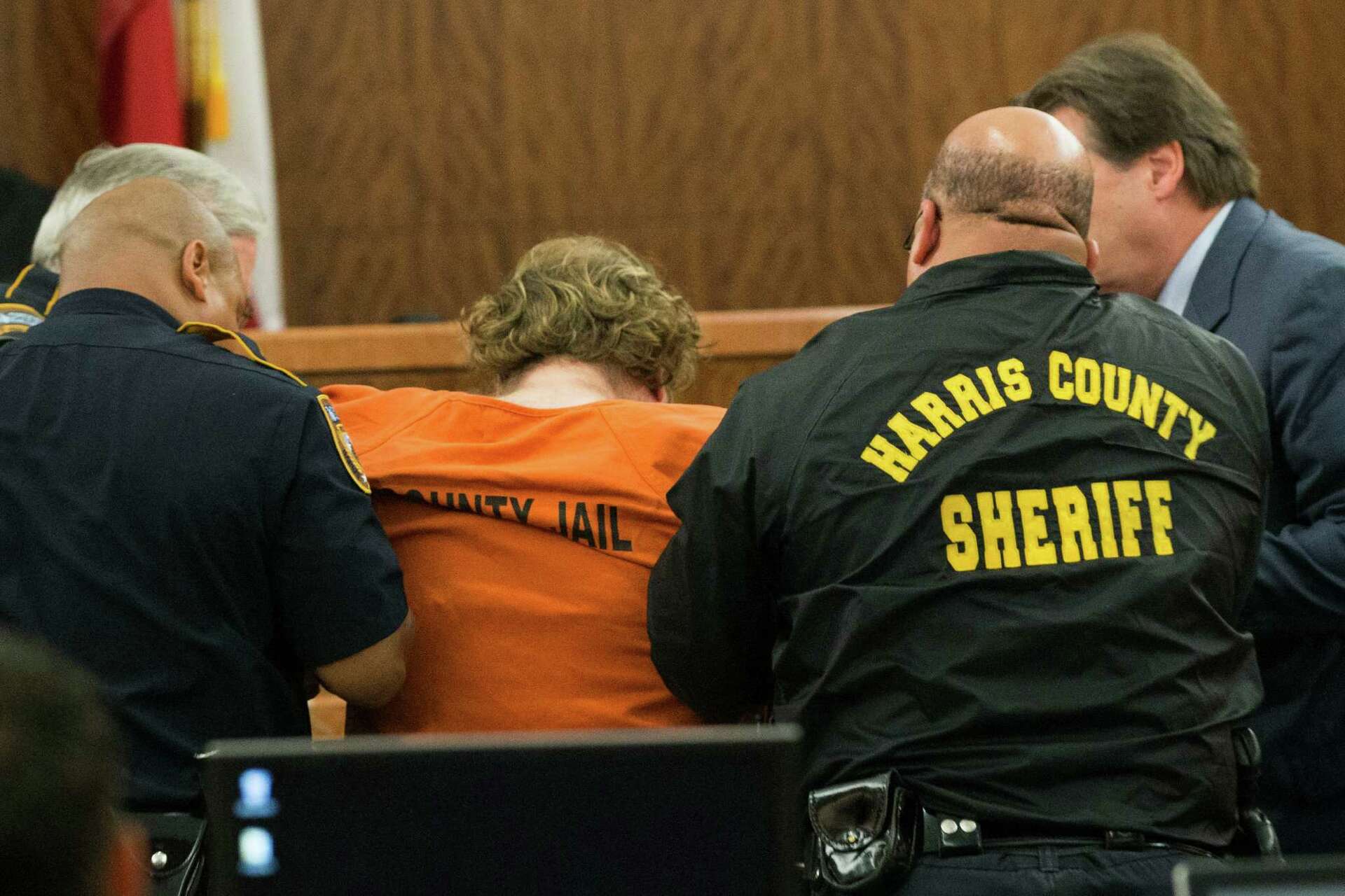 Suspect in Spring killings collapses in court