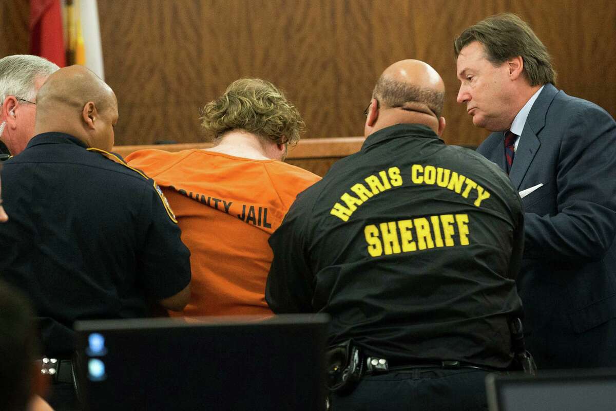 Suspect in Spring killings collapses in court