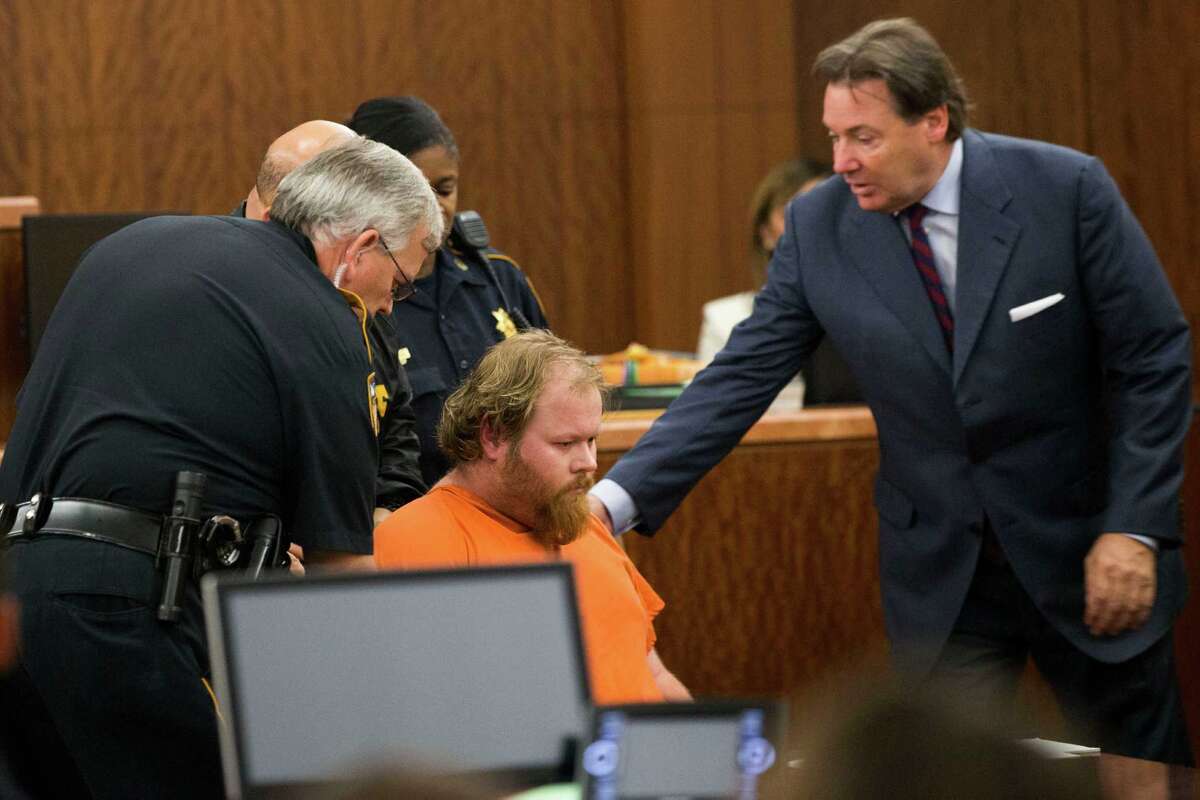 Suspect in Spring killings collapses in court