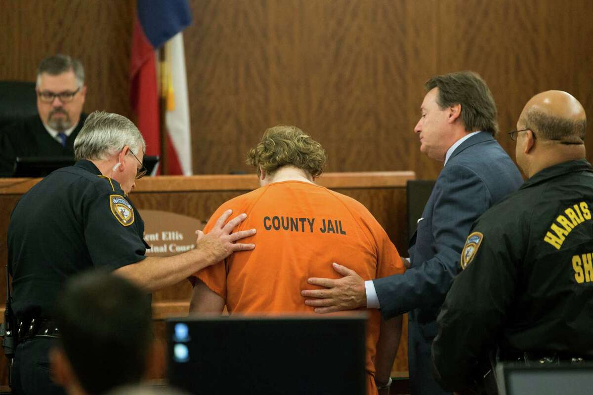 Suspect in Spring killings collapses in court