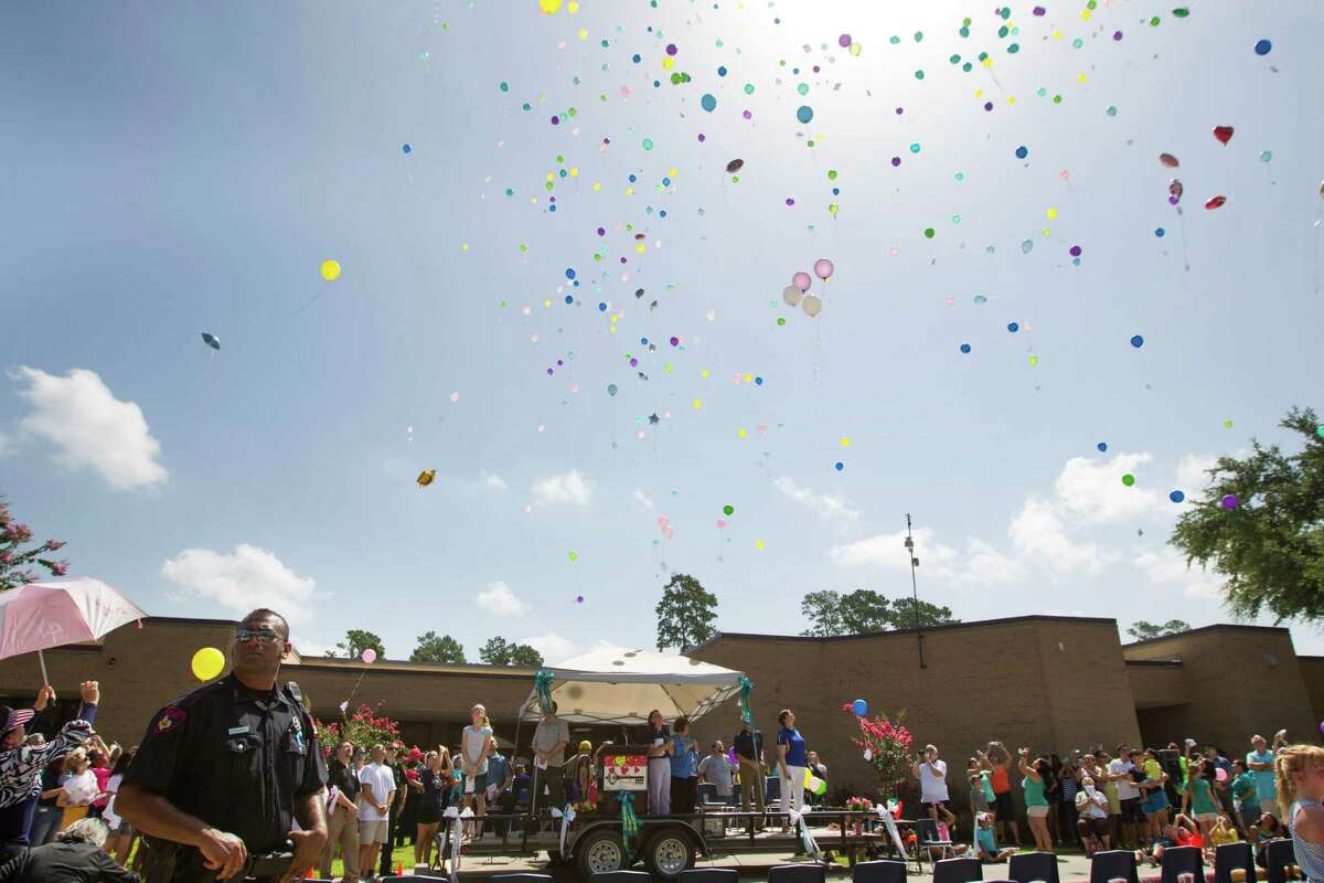 Hundreds gather to honor slain Spring family and sole survivor