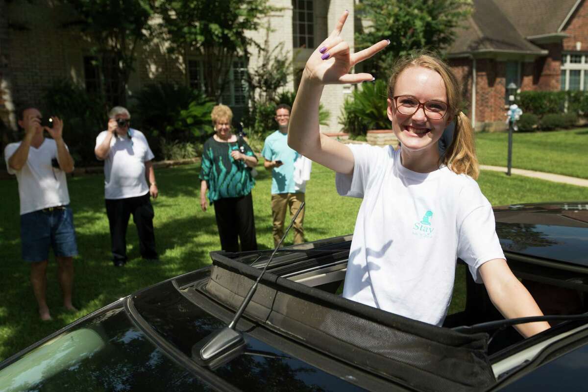 Hundreds gather to honor slain Spring family and sole survivor