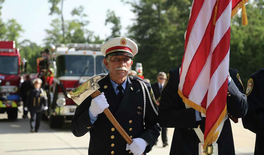 Hundreds march to honor fallen 21-year HFD veteran - Houston Chronicle