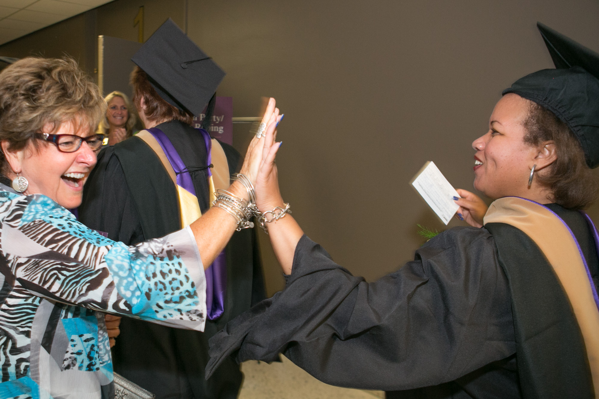 Excelsior College graduates receive diplomas