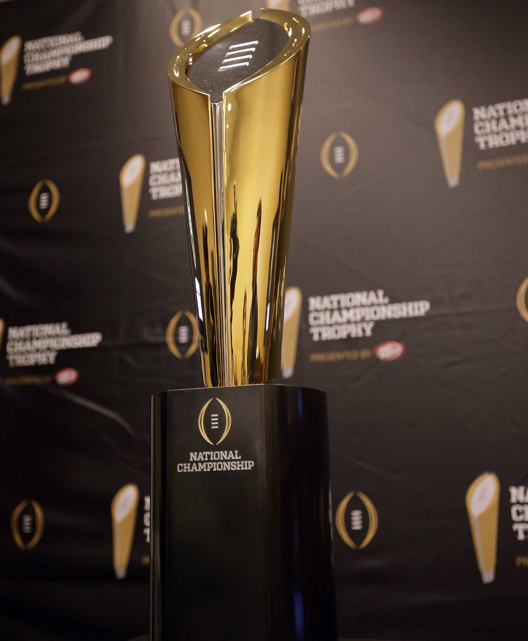 College football notebook: Golden playoff trophy unveiled