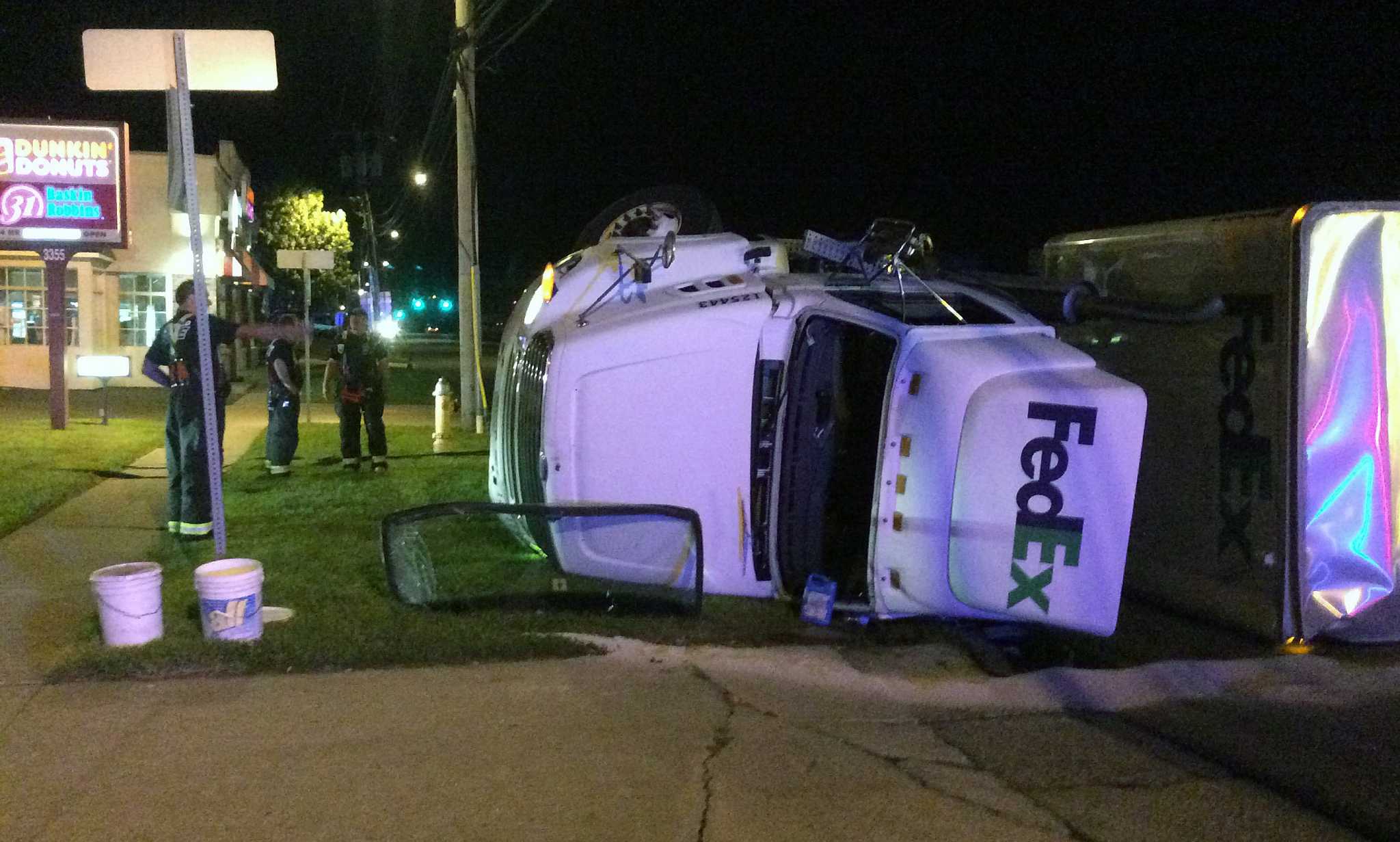 FedEx truck overturns after Post Road crash with SUV