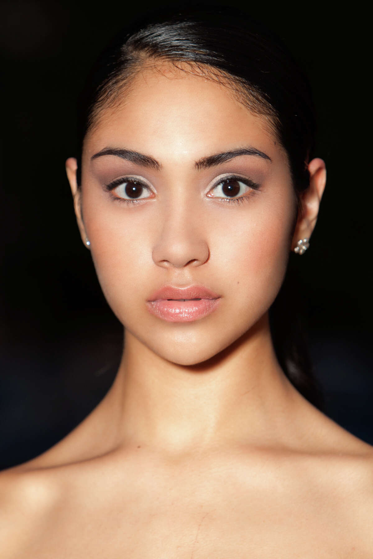 Alicia Aguilar balances modeling, homework