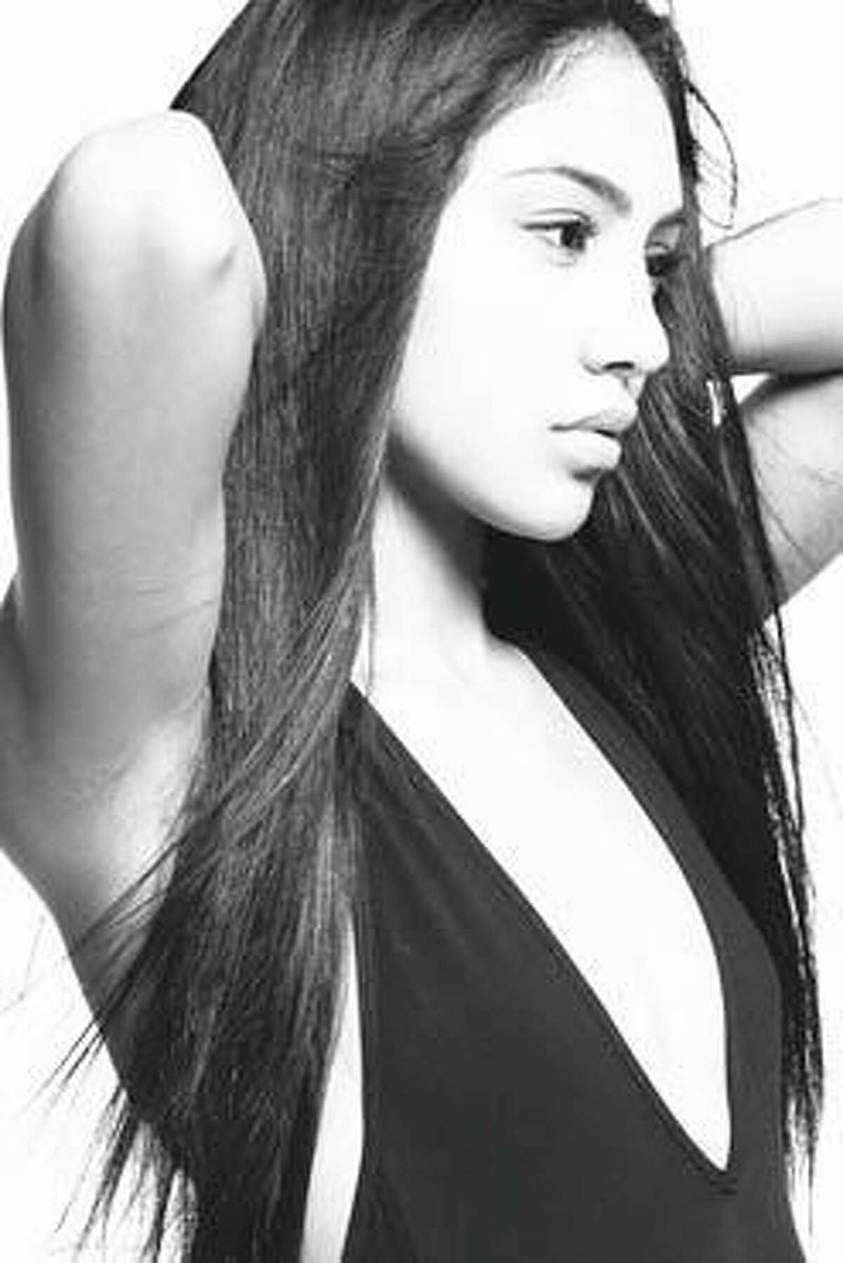 Alicia Aguilar balances modeling, homework
