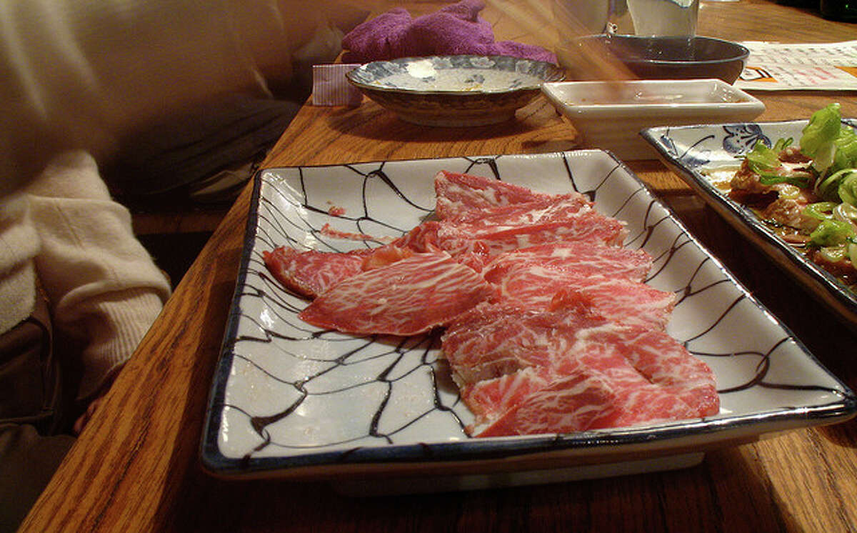 Restaurant serving hairy tarantula burgers for Exotic Meat Month