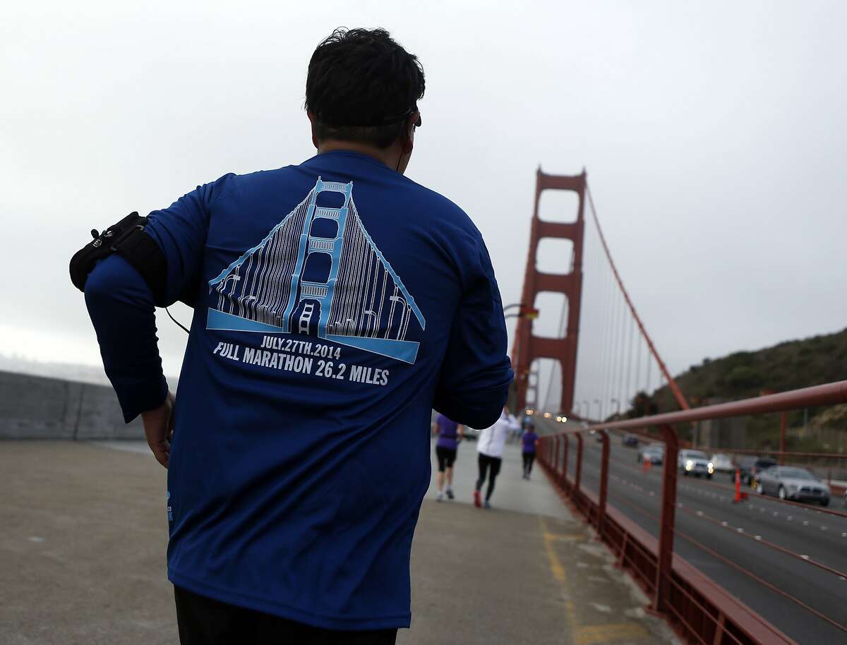 Morning cool helps as thousands pound S.F. Marathon