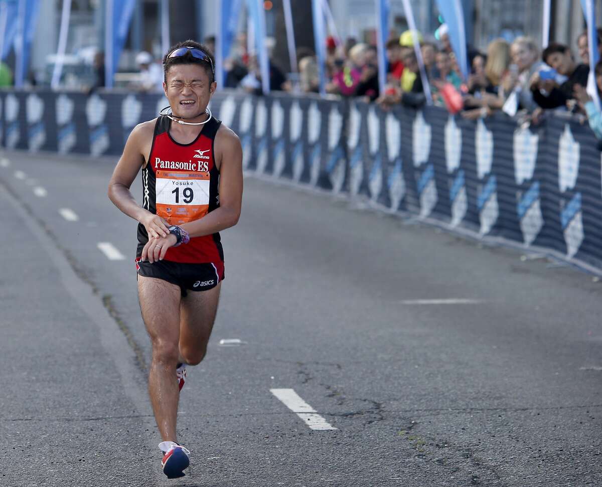 Morning cool helps as thousands pound S.F. Marathon
