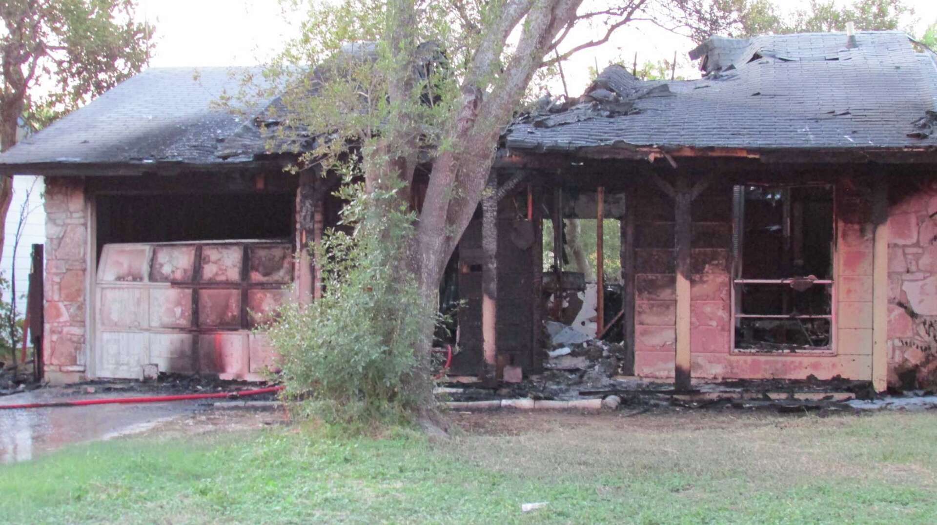 SAFD investigating house fire on Northwest Side