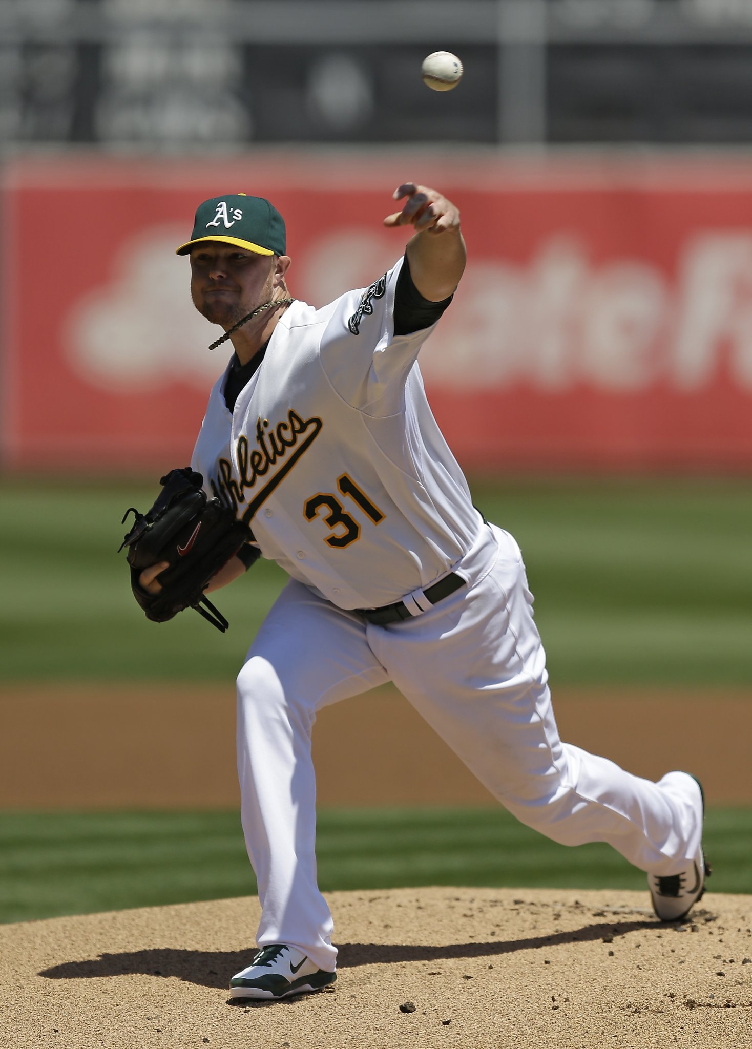 Lester's debut a big hit as A's cruise past Royals