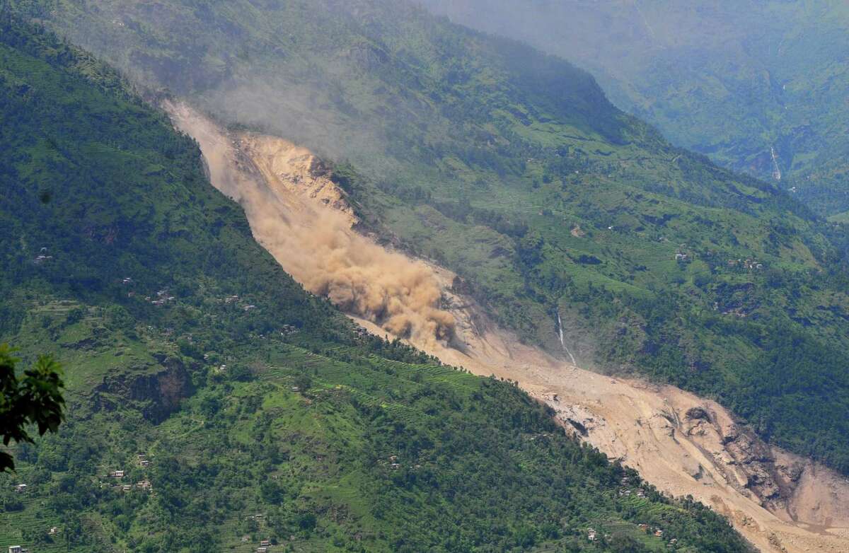 Massive landslide blocks river in Nepal; 8 dead