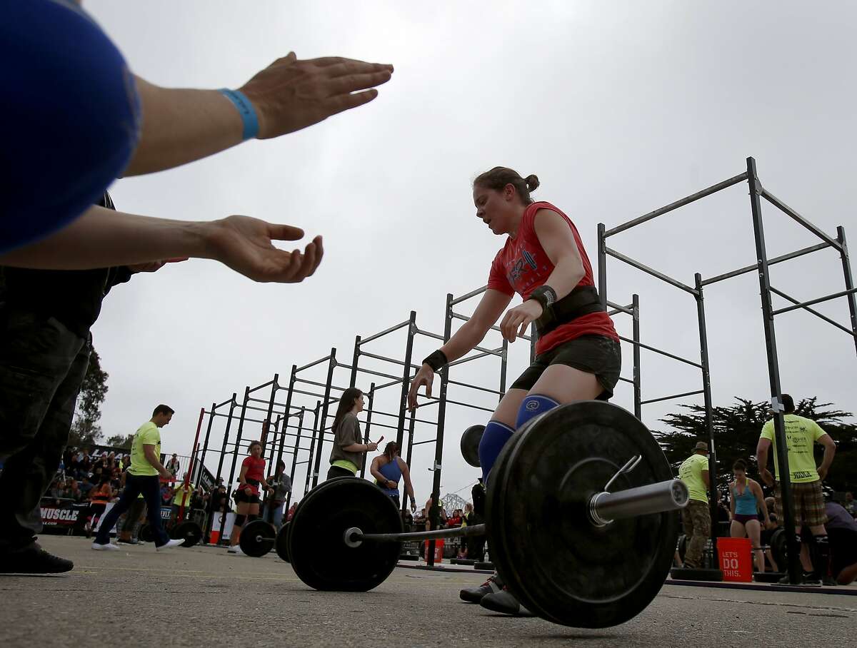 Hundreds sweat and strain at CrossFit contests on Treasure Island