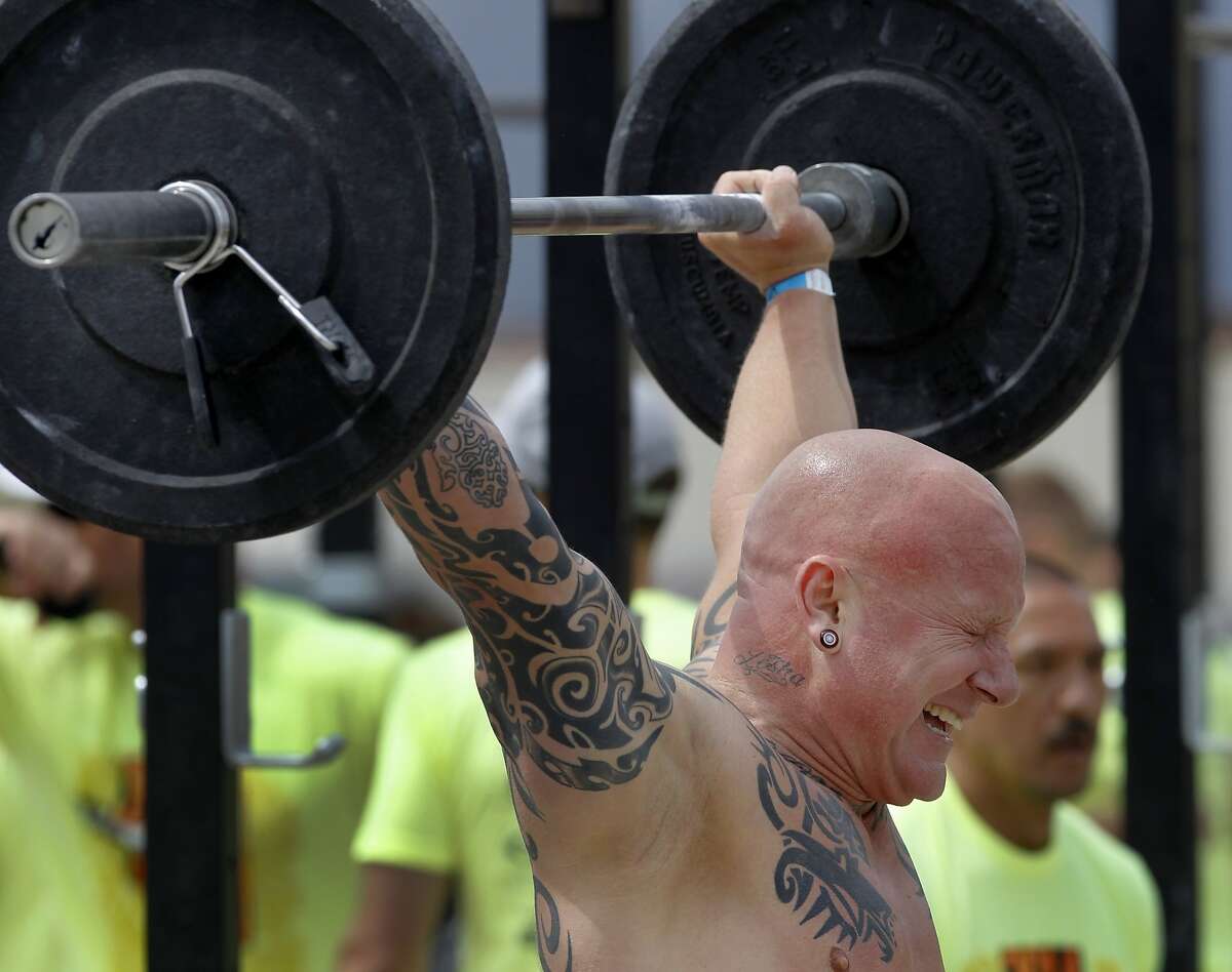 Hundreds sweat and strain at CrossFit contests on Treasure Island