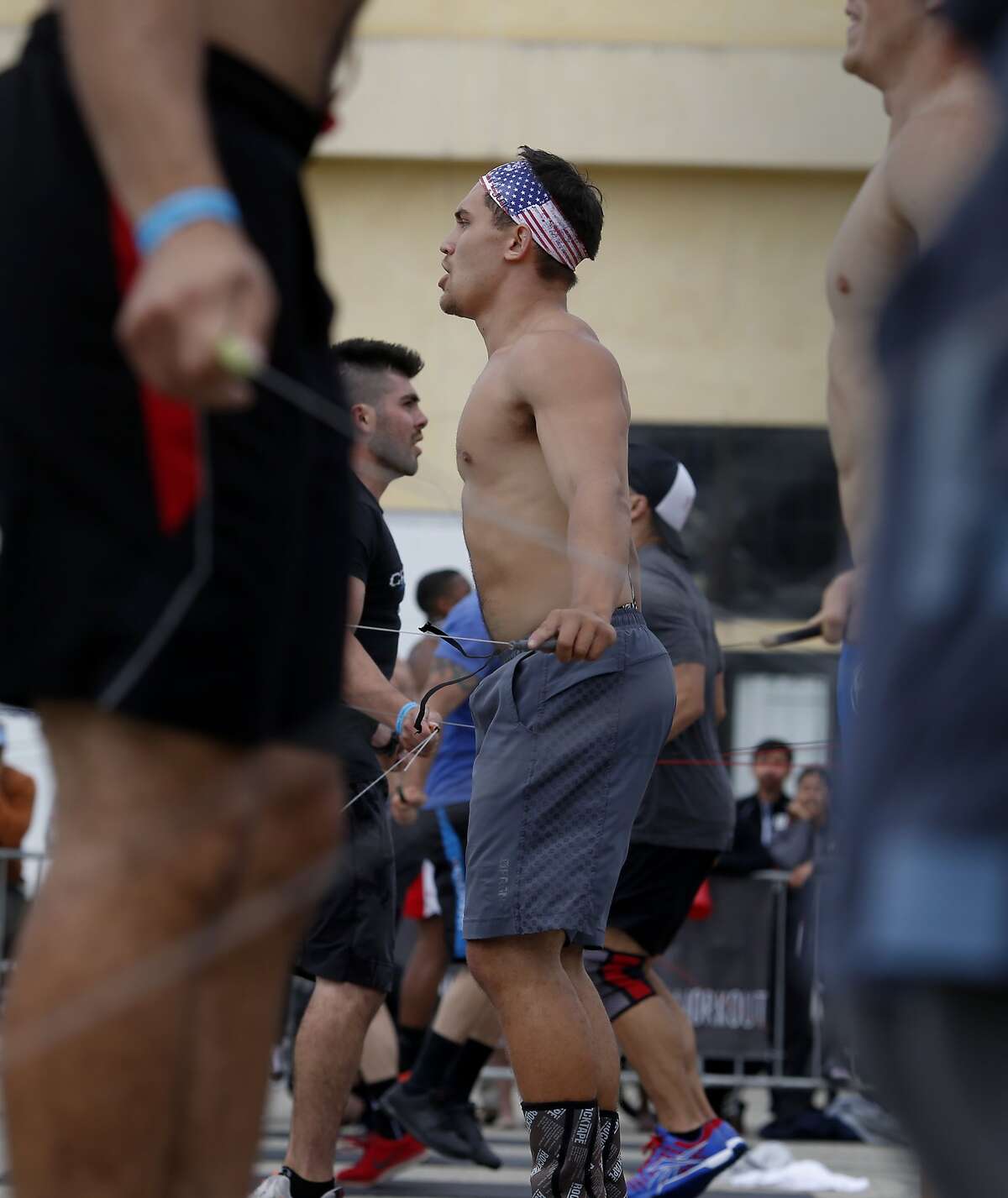 Hundreds sweat and strain at CrossFit contests on Treasure Island
