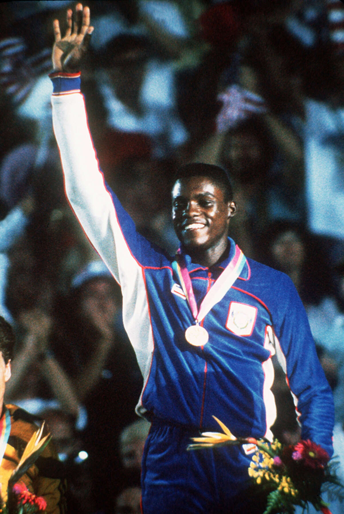 Carl Lewis donating Olympic medals to new Smithsonian museum