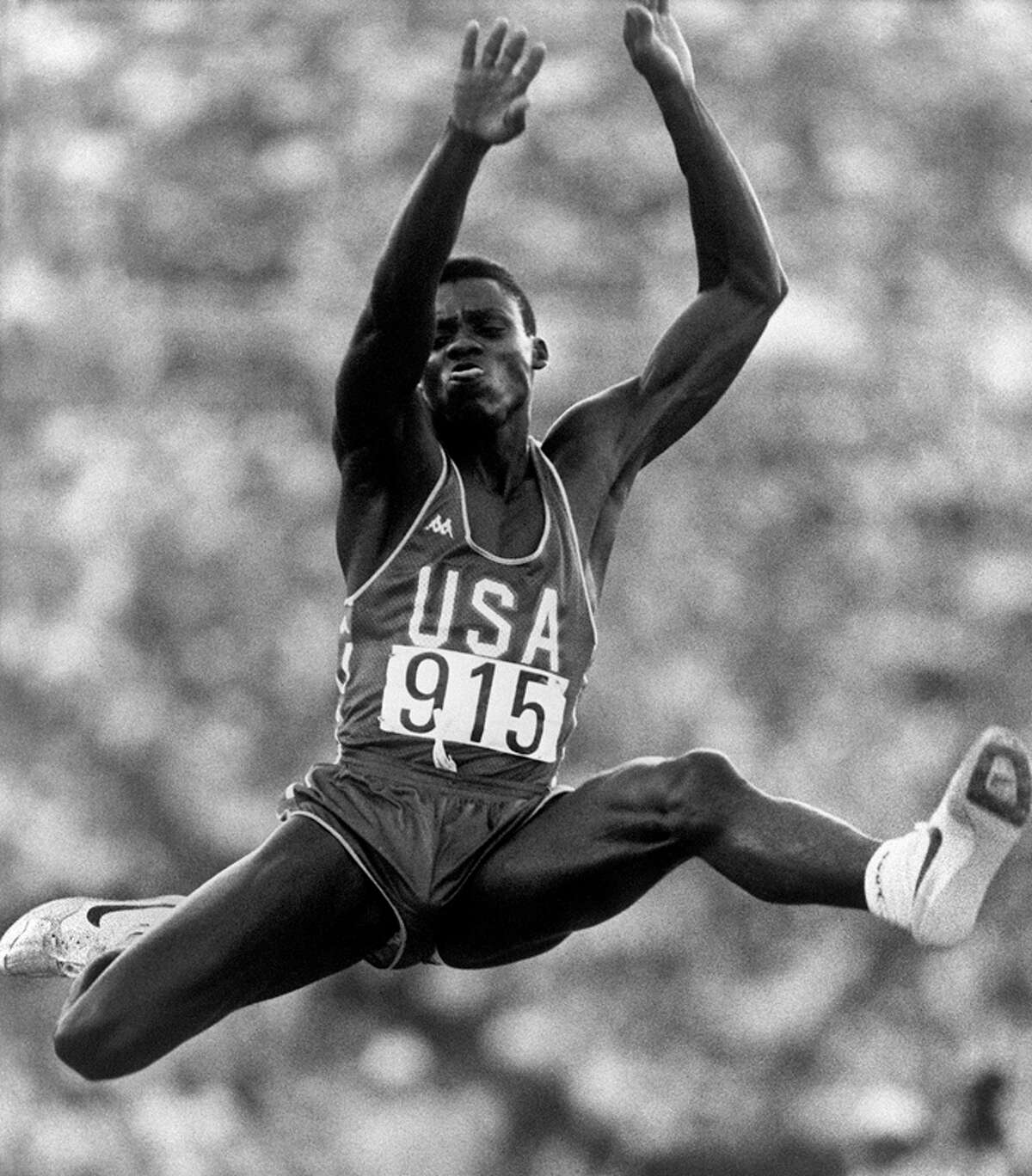 Carl Lewis donating Olympic medals to new Smithsonian museum