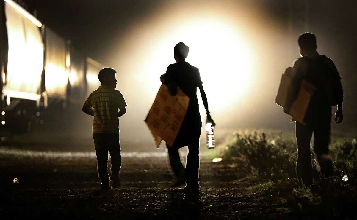 Photos show migrants riding trains through Mexico to U.S.