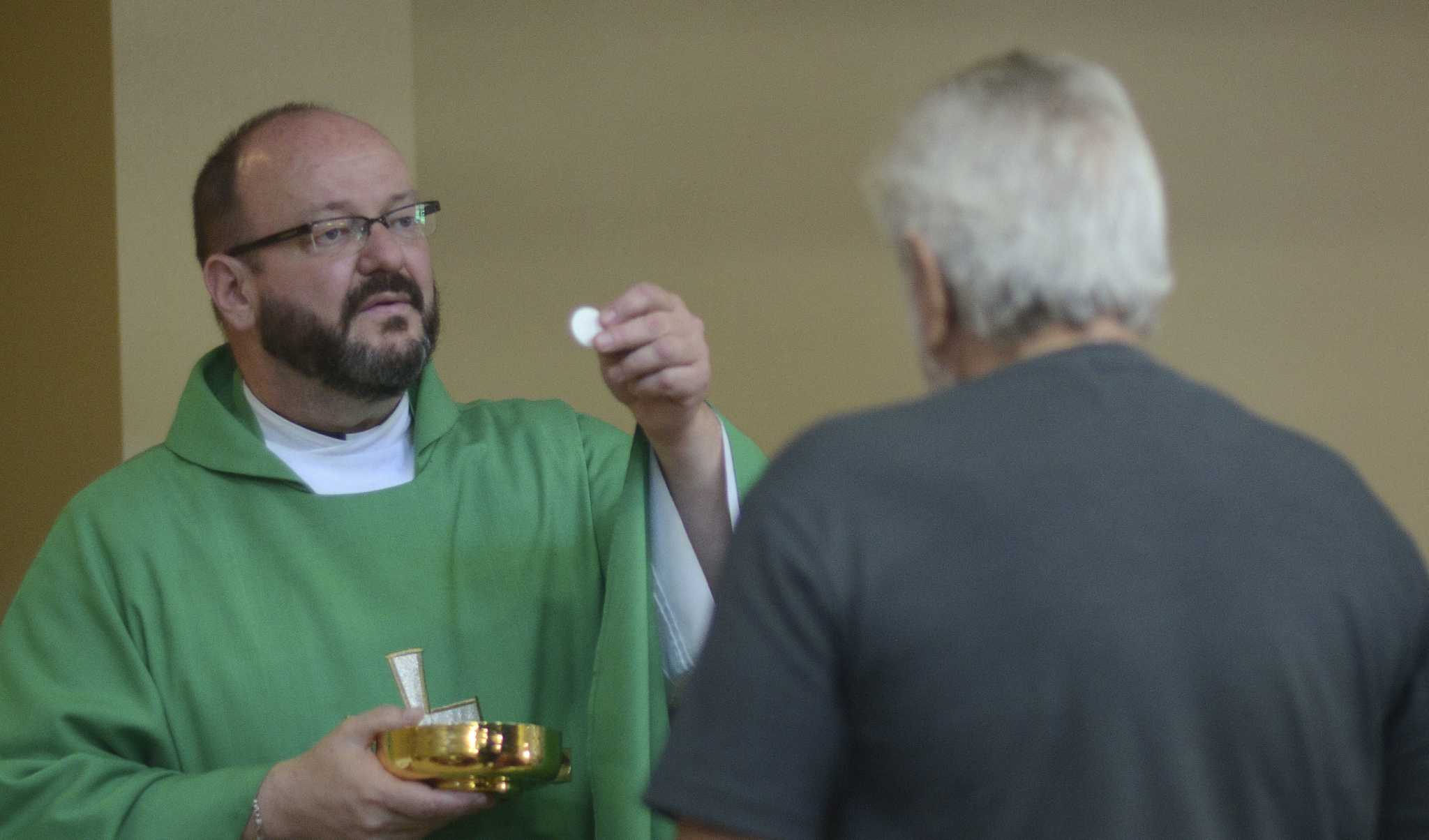 Inner-city parishes sharing priests