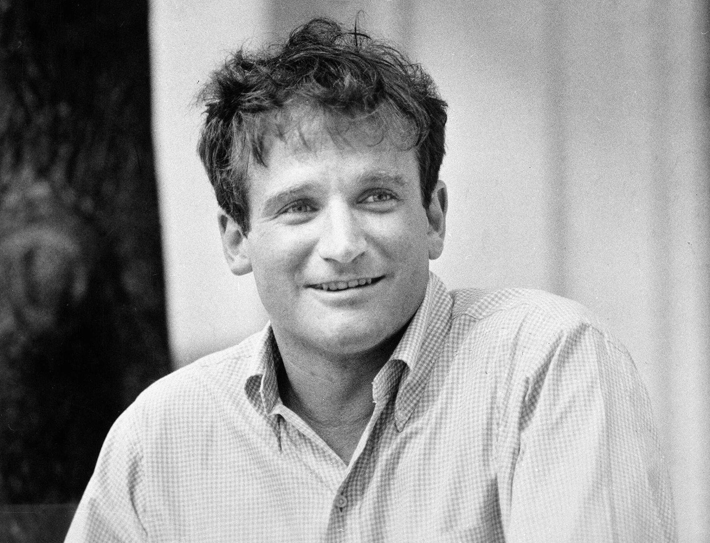 Friends, fellow comedians react to Williams' death