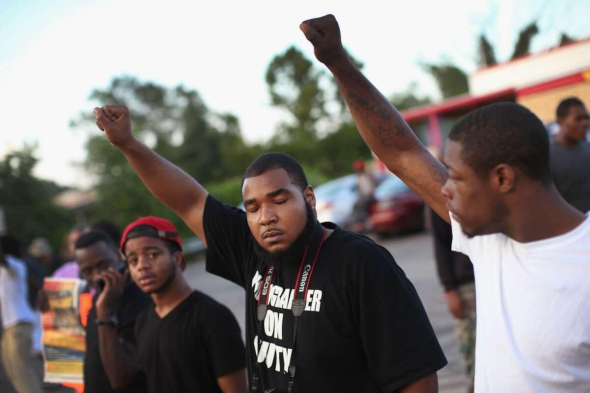 Ferguson protests should spark peaceful uprising of raised hands