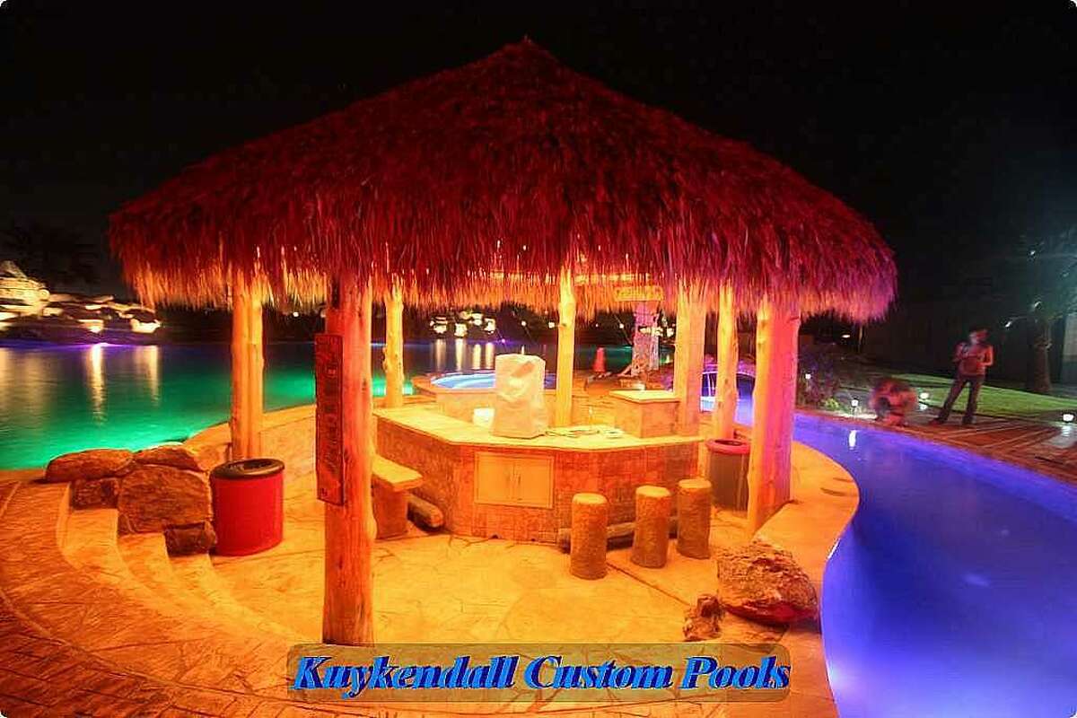 World's largest backyard swimming pool gives Texas home a tropical feel