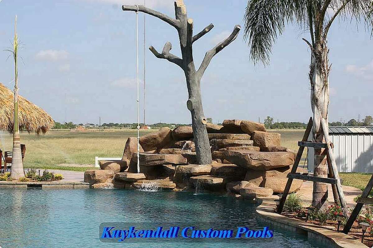 World's largest backyard swimming pool gives Texas home a tropical feel