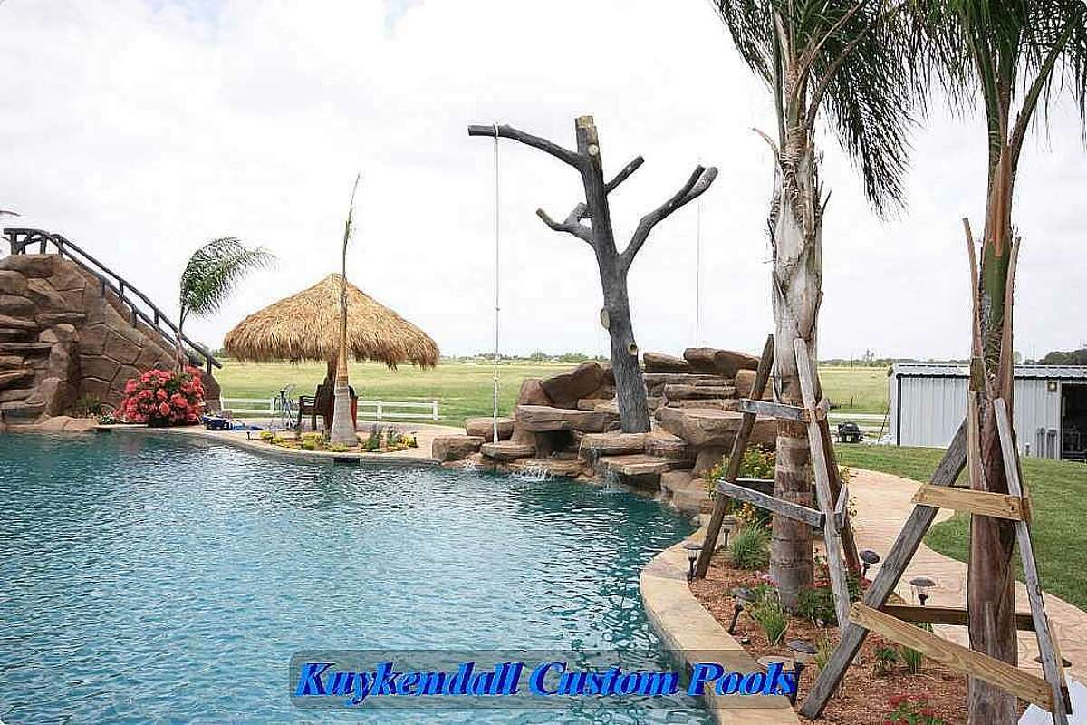 World's largest backyard swimming pool gives Texas home a tropical feel