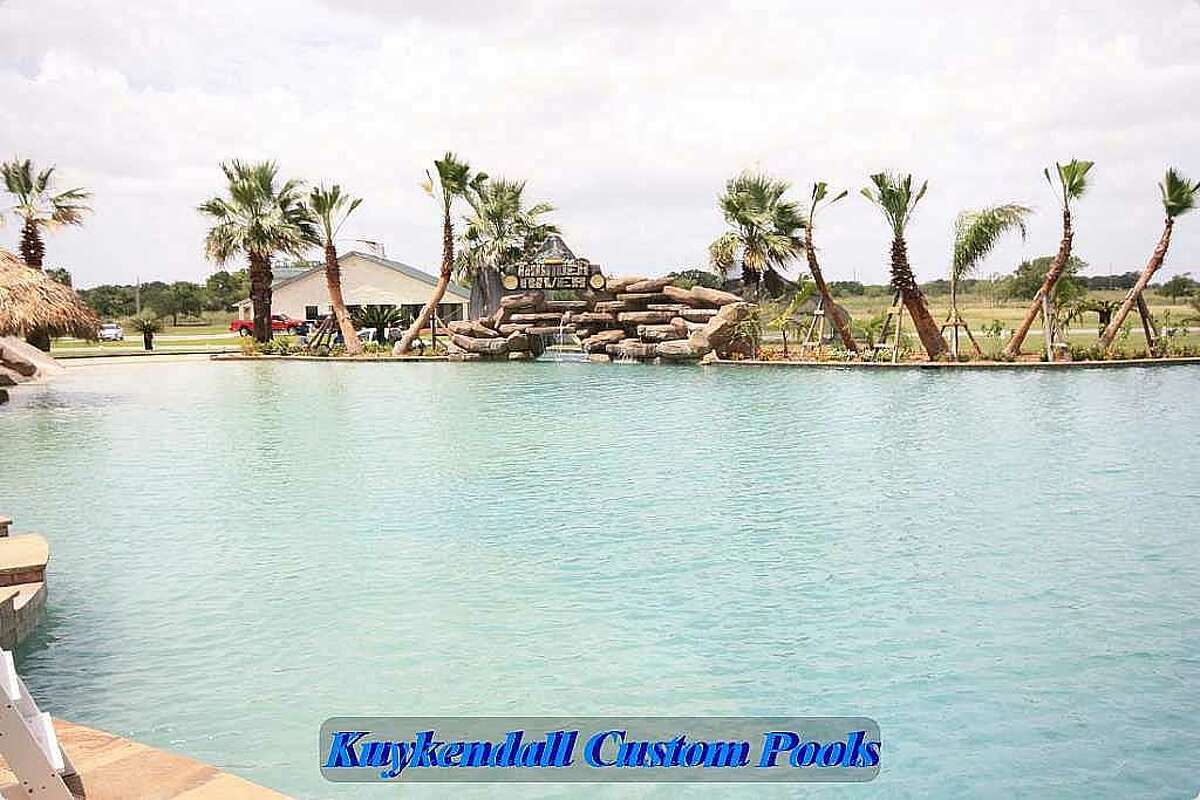 World's largest backyard swimming pool gives Texas home a tropical feel