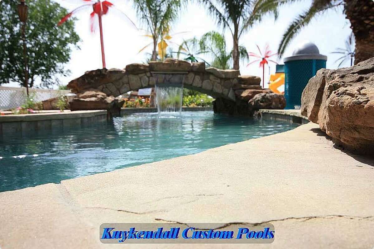 World's largest backyard swimming pool gives Texas home a tropical feel
