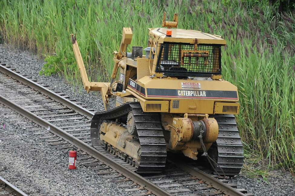 Runaway bulldozer rides the rails