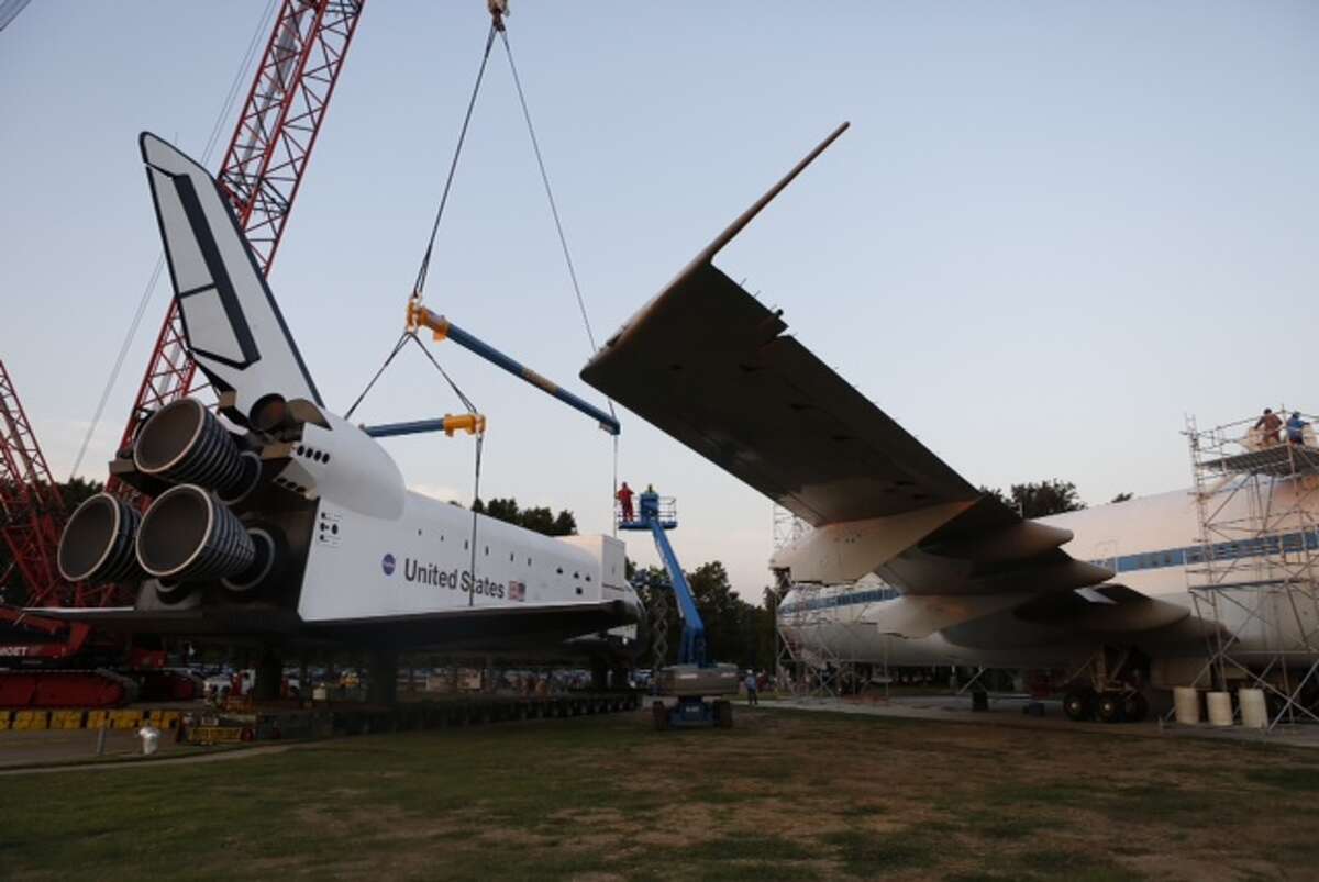 Shuttle replica makes final landing atop 747 at Space Center Houston