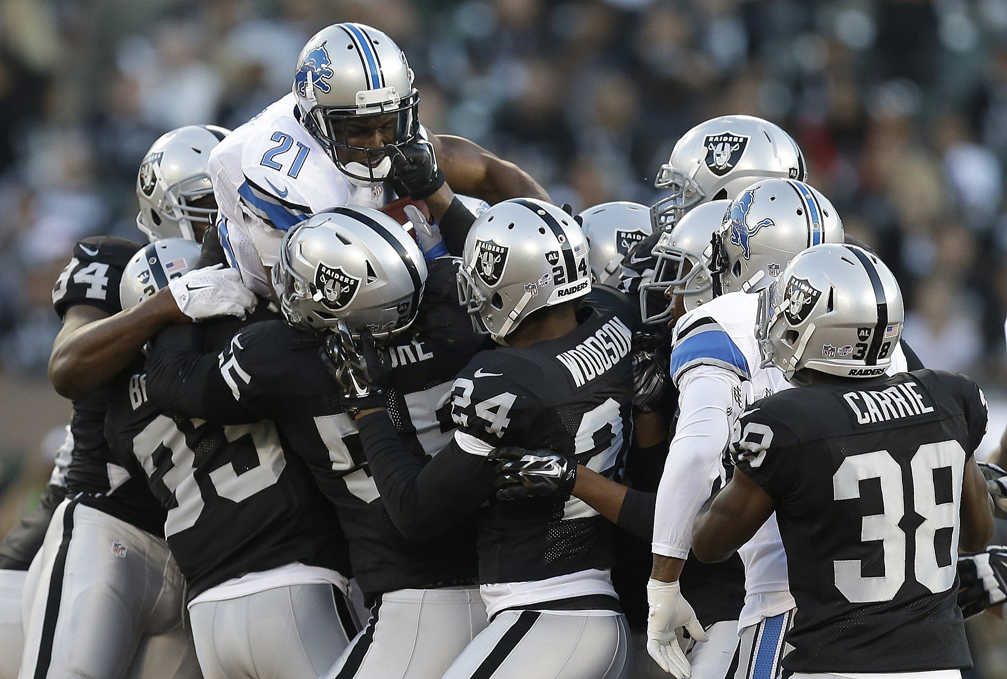 3rd-string QB Matt McGloin leads Raiders to win over Lions