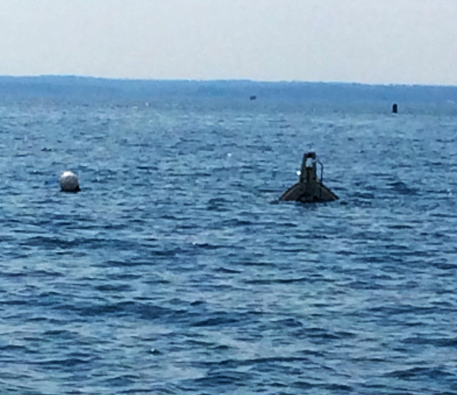 Police rescue five men from sinking boat