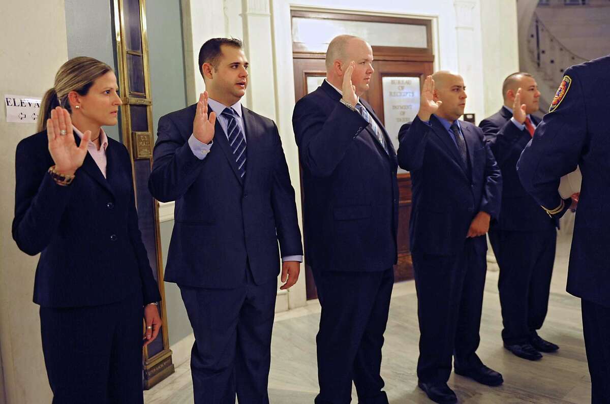 Five hired, three promoted at fire department ceremony