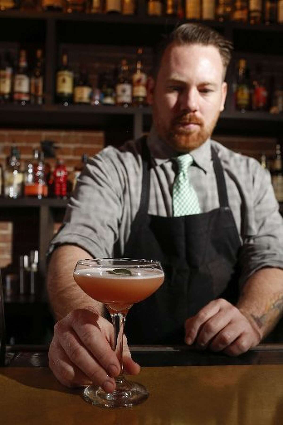 Moving Sidewalk cocktail bar to open downtown this weekend