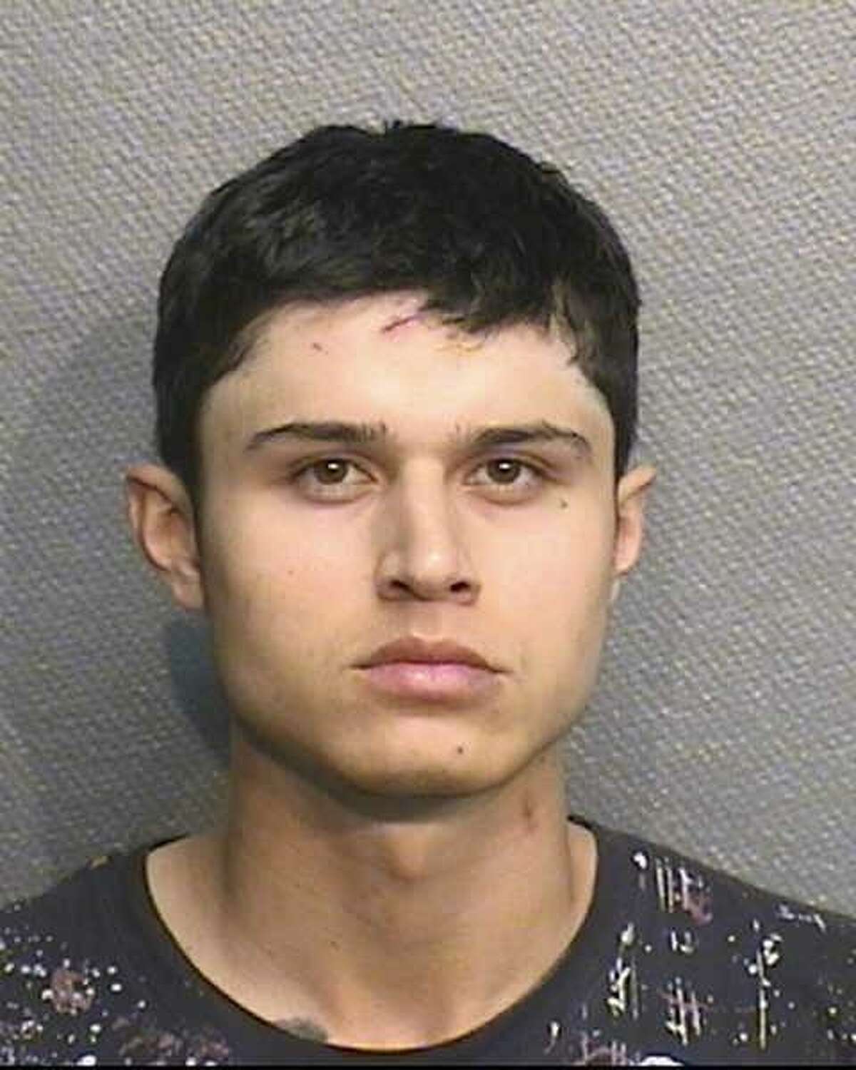 Man apprehended in 2013 death of estranged wife found with slashed throat