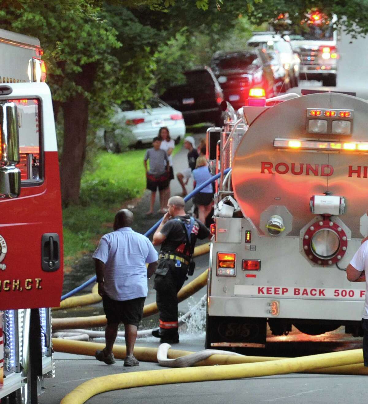Quick jump helps Greenwich firefighters save house from blaze