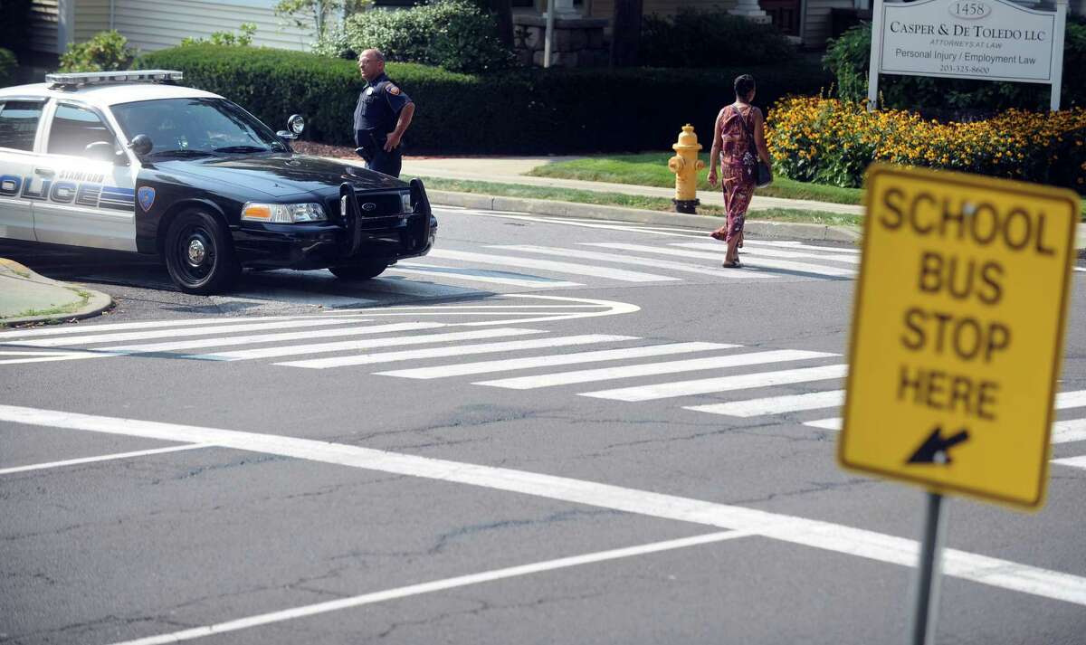 Four ticketed for passing Stamford school buses