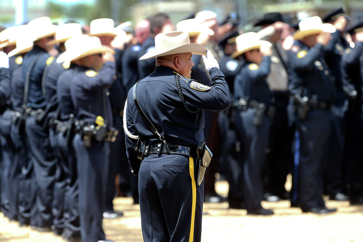 Hundreds remember slain Elmendorf chief